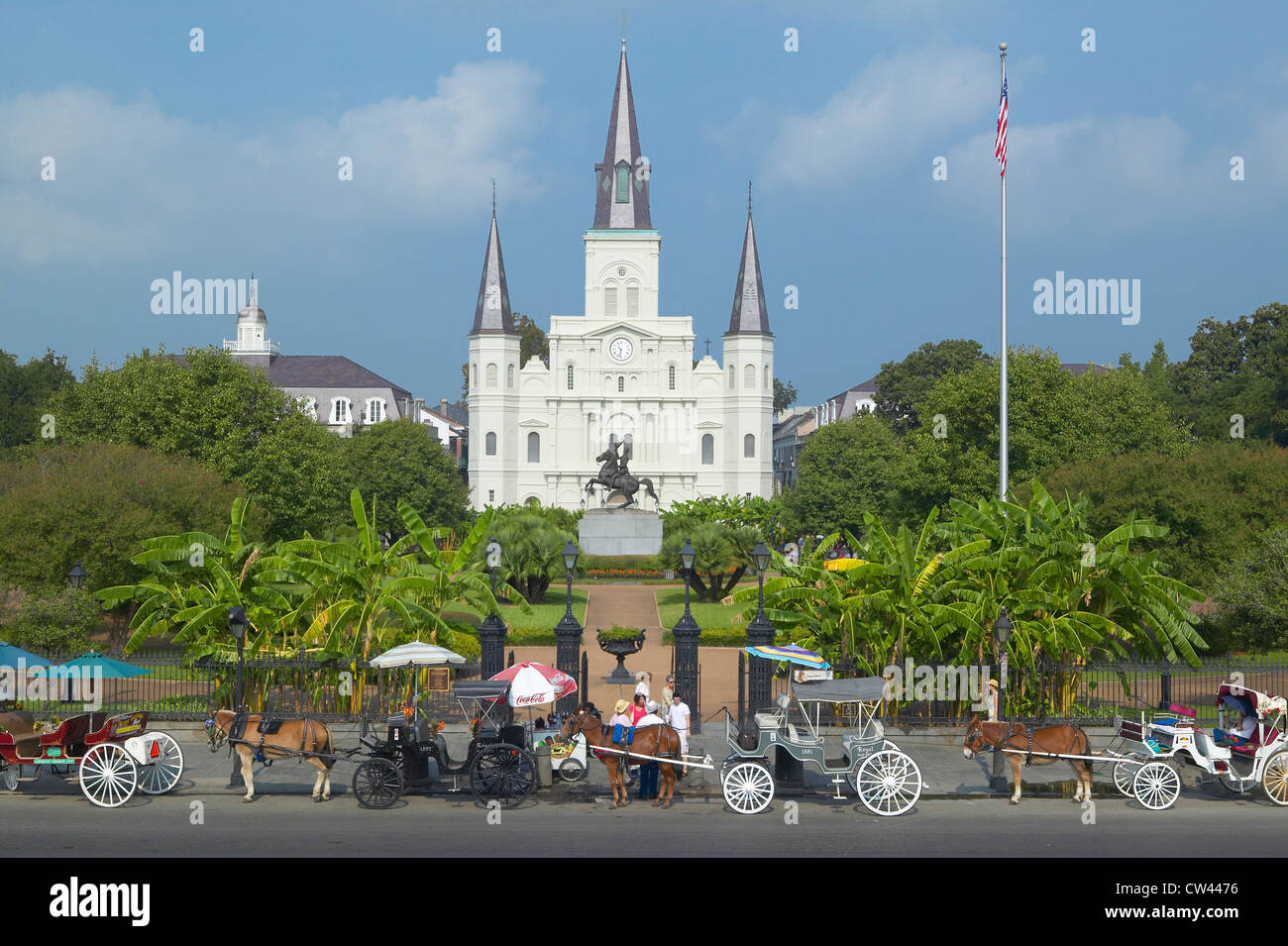 Horse Carriage and tourists in front of Andrew Jackson Statue & St ...