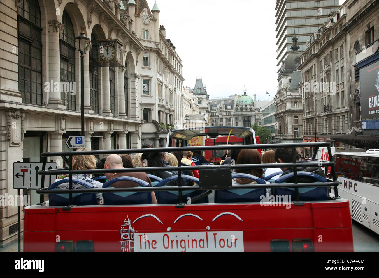 London Sightseeing bus. Tourists love open-top tour bus enable them, a ...