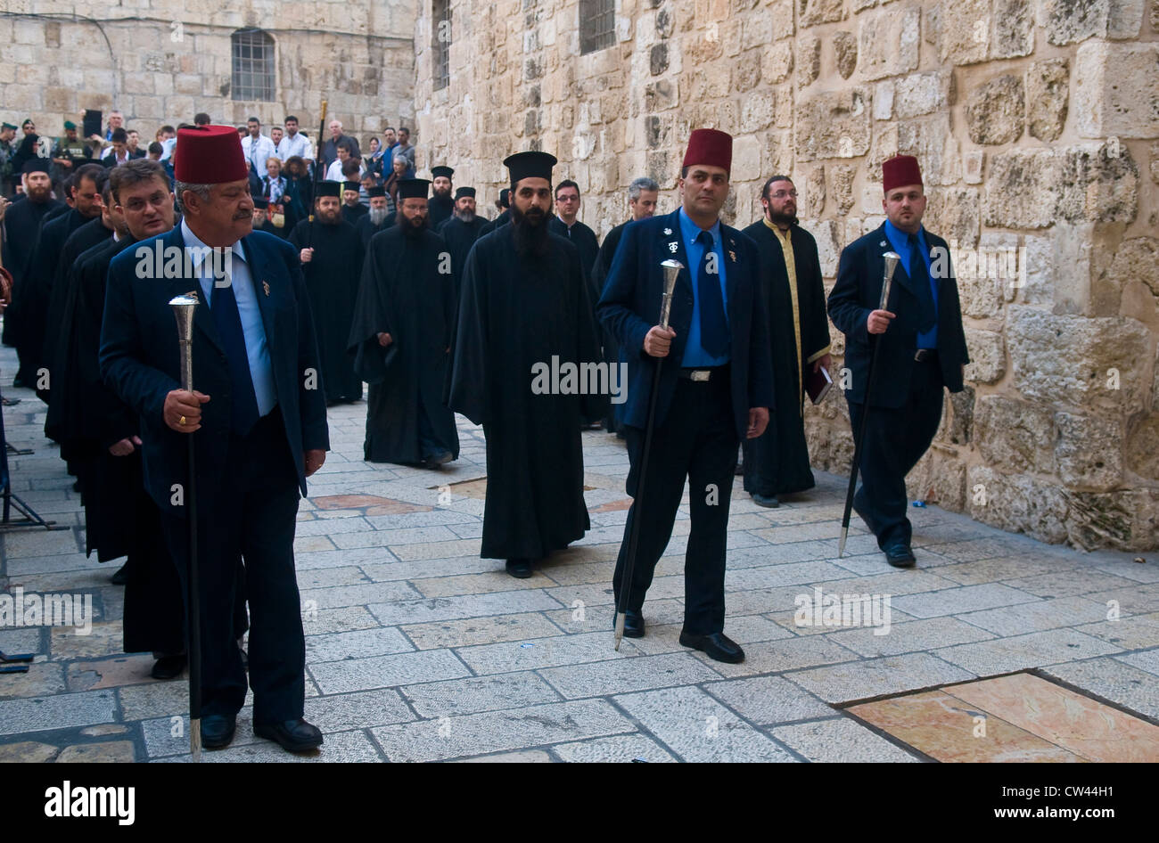 Greek Orthodox monks takes part in the Good Friday procession in ...