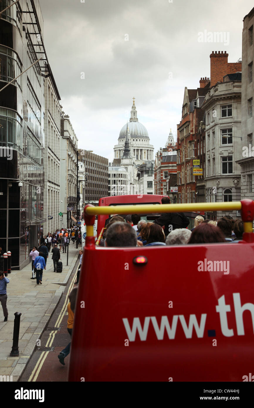London Sightseeing bus. Tourists love open-top tour bus enable them, a ...
