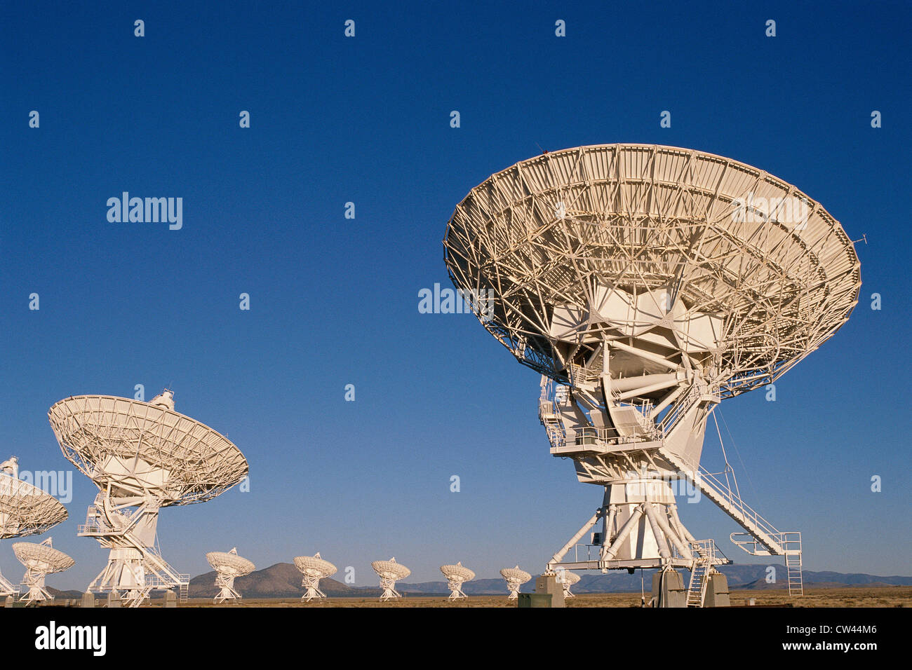 VLA Very Large Array radio telescope dish with others in background ...