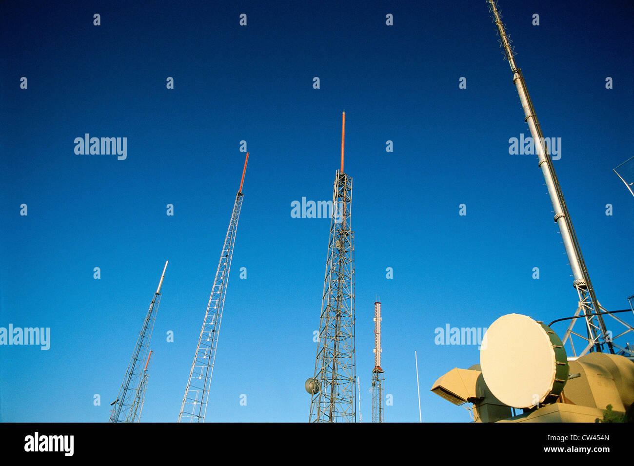 TV/radio antenna pointing into sky Stock Photo - Alamy