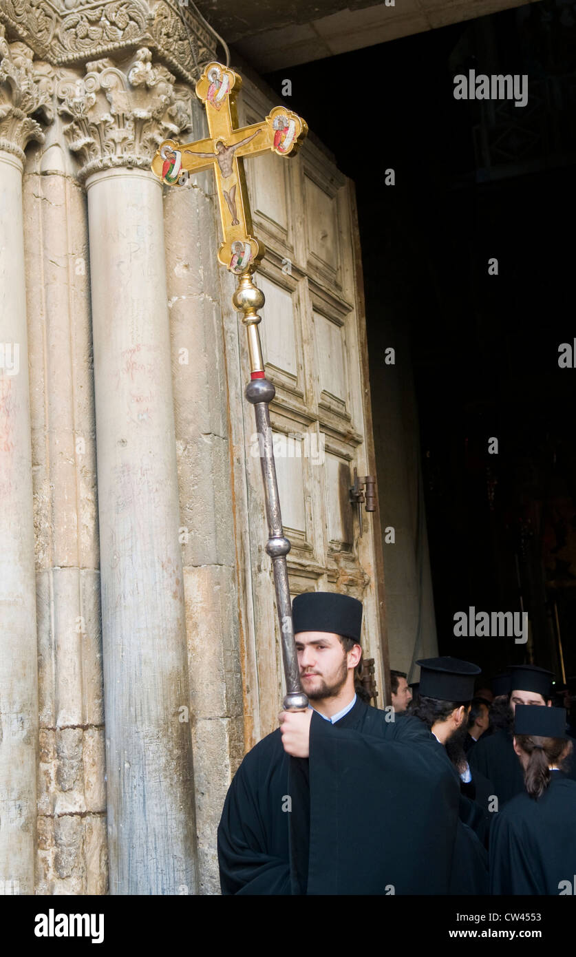 Greek Orthodox monks takes part in the Good Friday procession in ...