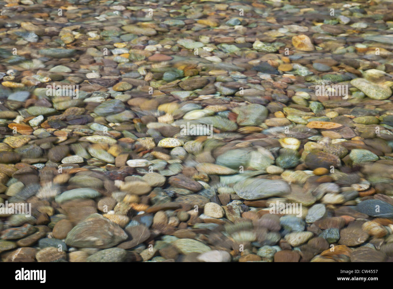 Pebbles under water, high angle view Stock Photo - Alamy