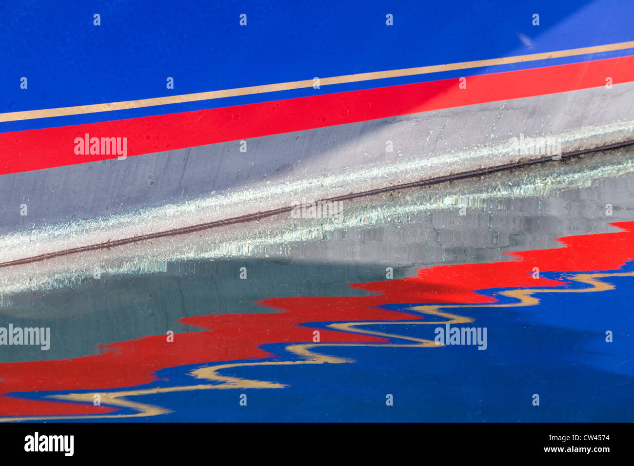 Close-up of boat's reflection in water Stock Photo - Alamy