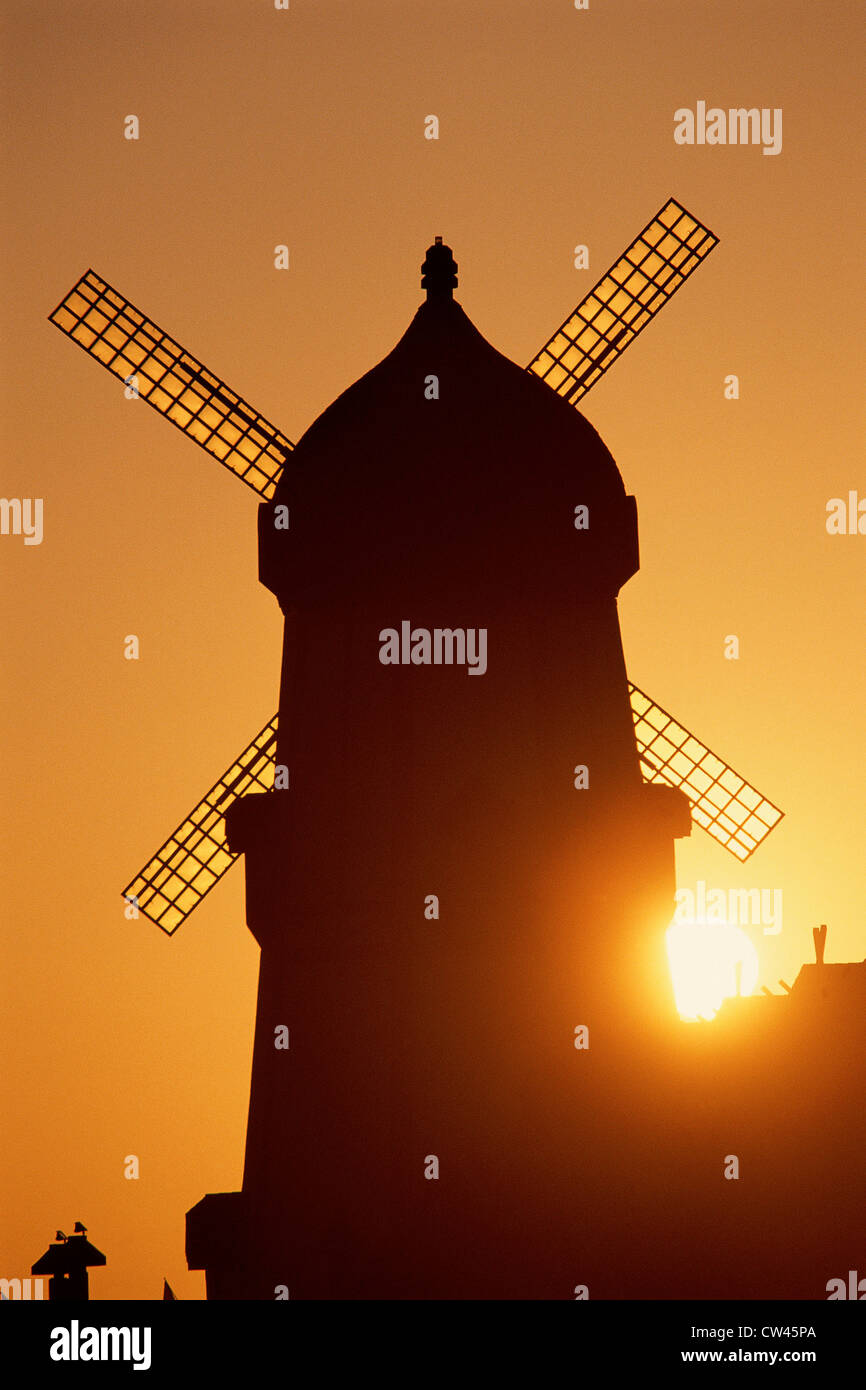 Classic windmill against sunset Stock Photo - Alamy