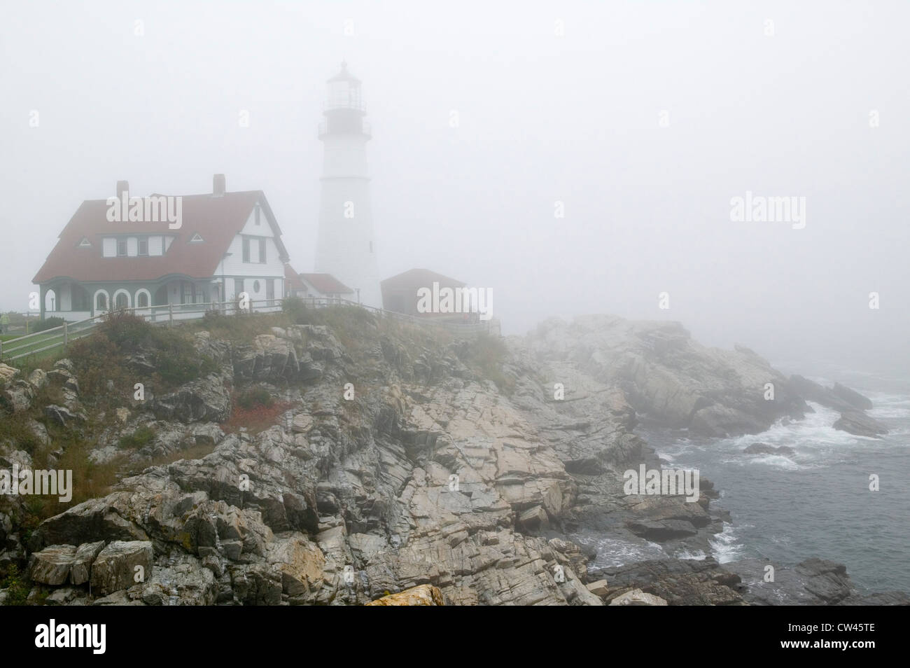Fog shrouds the Portland Head Lighthouse in Cape Elizabeth, Maine Stock ...