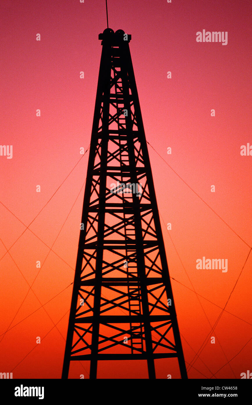 Oil drilling rig at sunset Stock Photo - Alamy