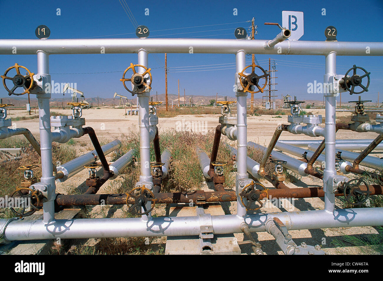 Pipes from oil well Stock Photo - Alamy