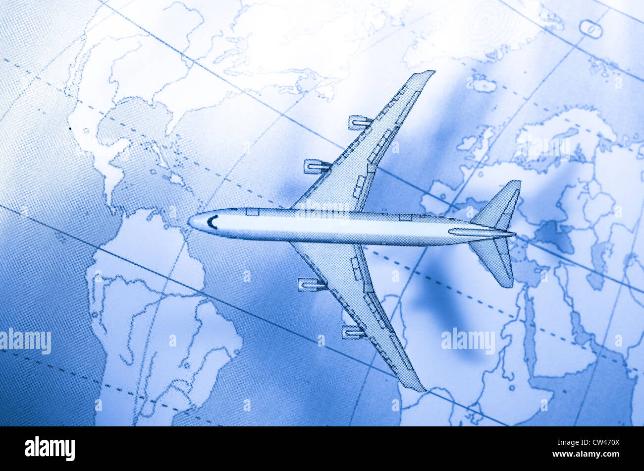 Airplane above the map in blue Stock Photo - Alamy
