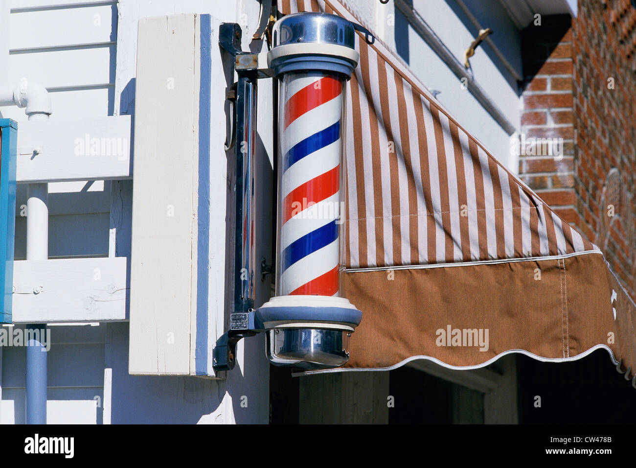 Barber shop pole Stock Photo - Alamy