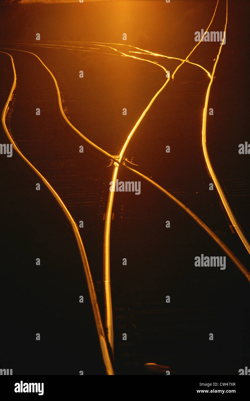Sunshine reflecting off railroad tracks Stock Photo - Alamy