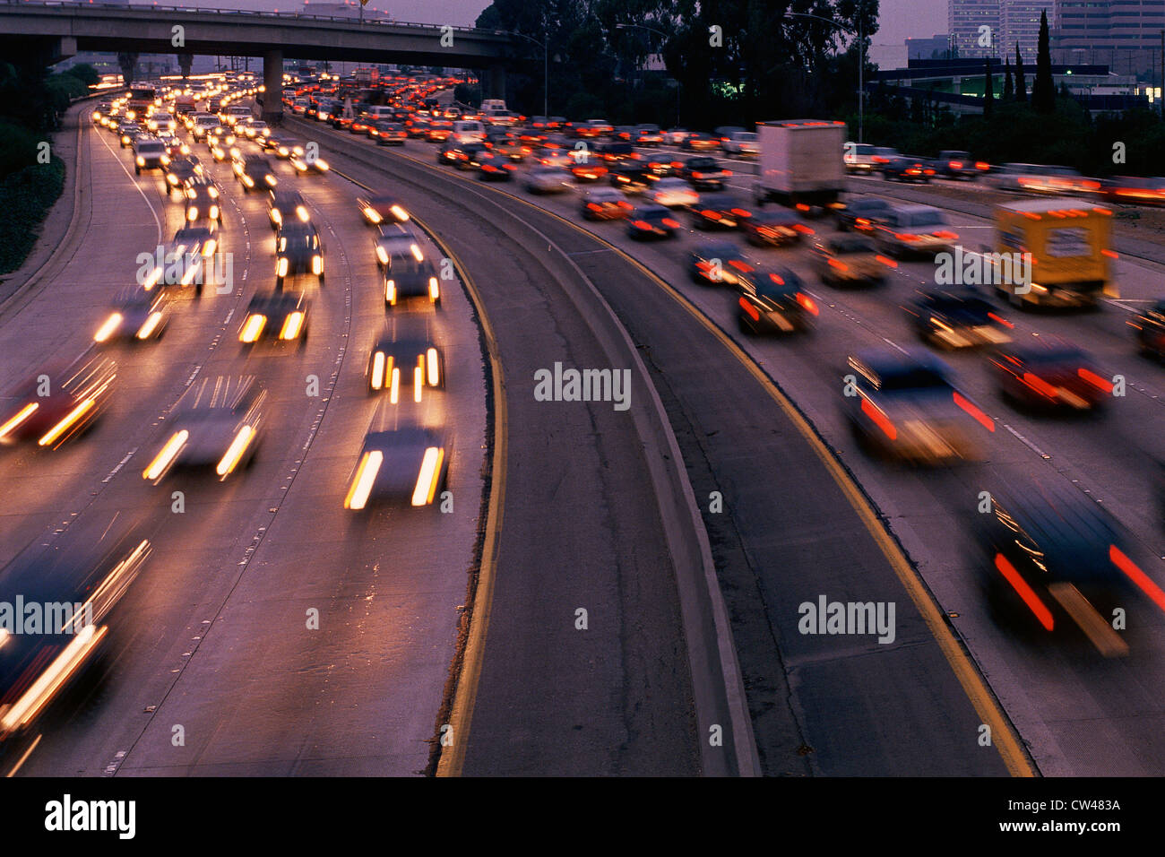 Heavy traffic on freeway at twilight Stock Photo - Alamy