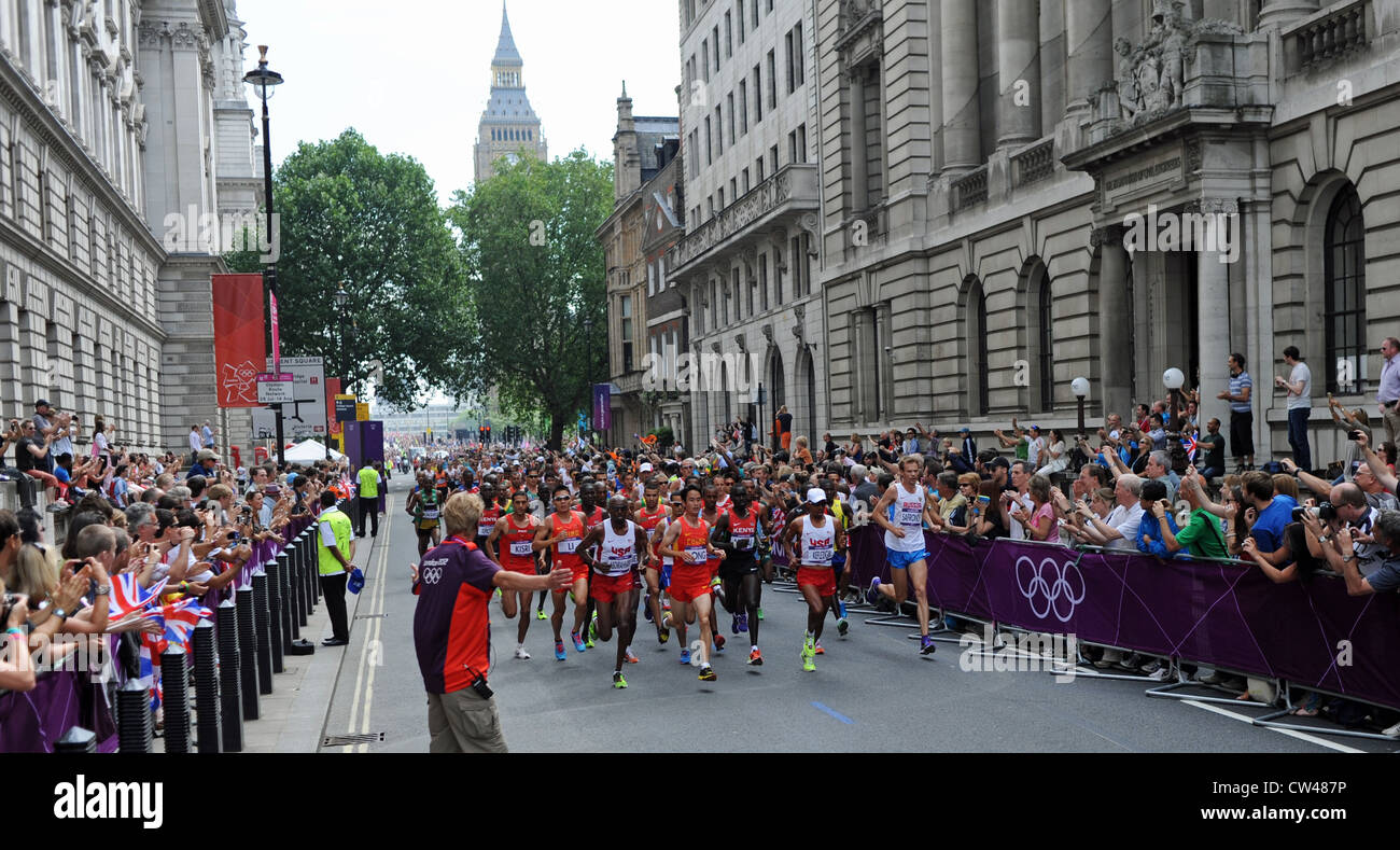 Crowds waving union jack flags during the London Olympic Marathon Mens ...
