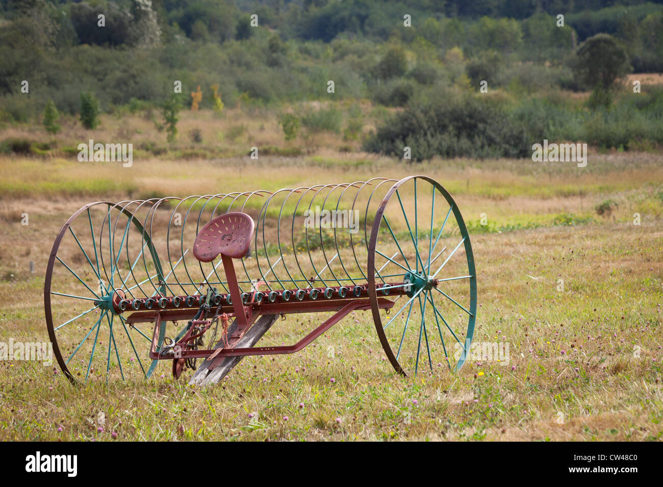 USA, Washington, Silverdale, Historic Petersen Farm, Hay rake Stock ...