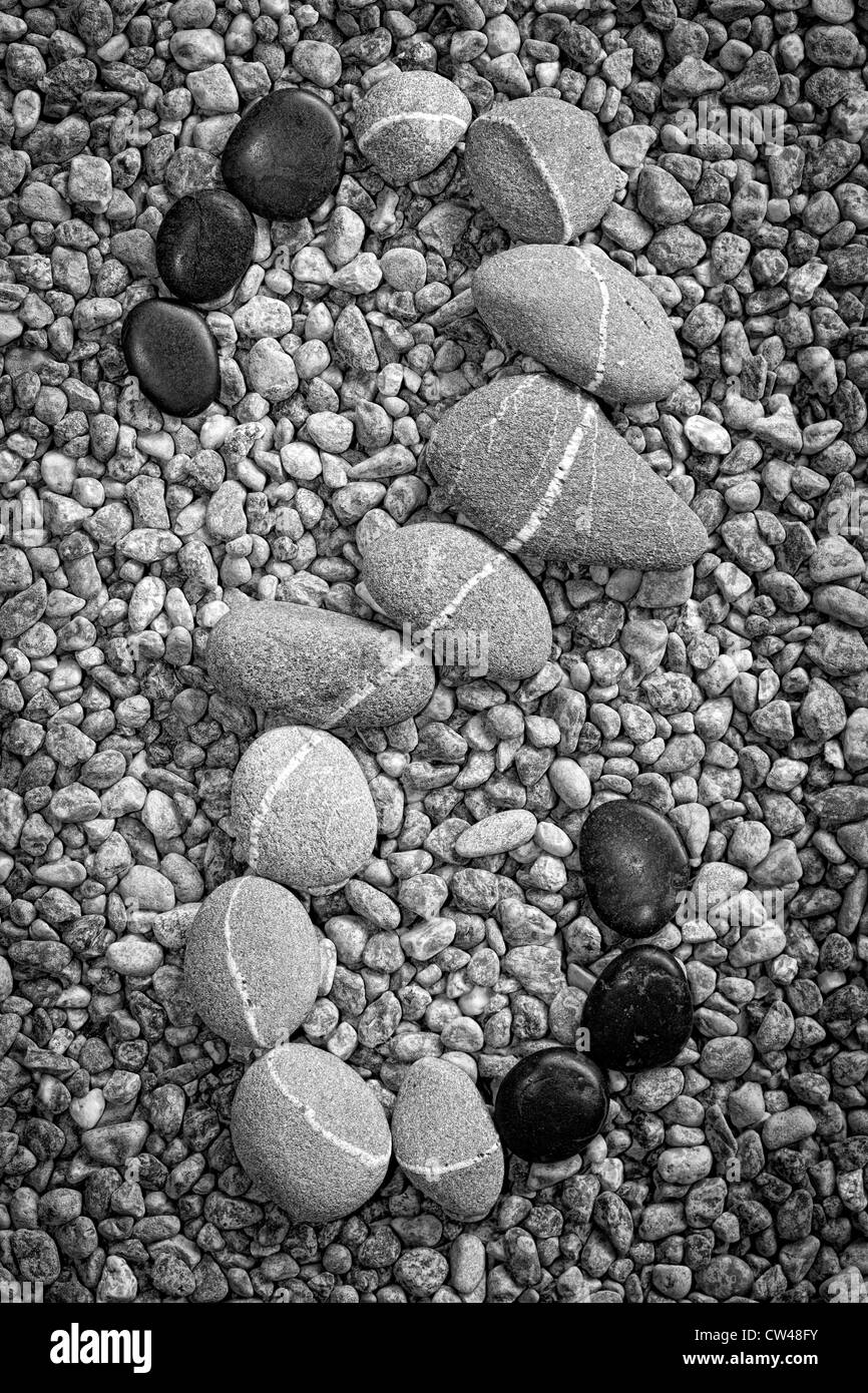S-shape pattern made with pebbles Stock Photo - Alamy