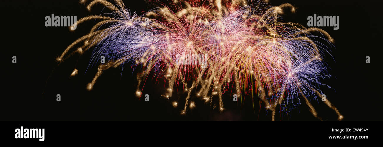 Cluster of fireworks exploding Stock Photo - Alamy