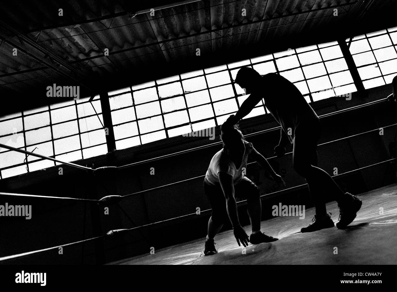 A female Lucha libre wrestler trains with her male sparring partner at ...