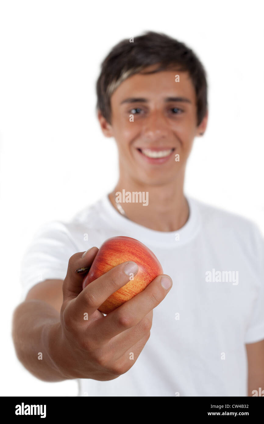 young swarthy man with brown eyes and a red apple in his hand on white ...