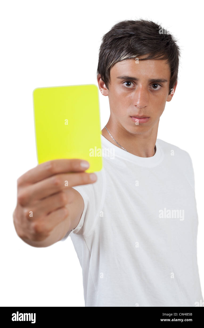 young swarthy man with brown eyes showing yellow card Stock Photo - Alamy