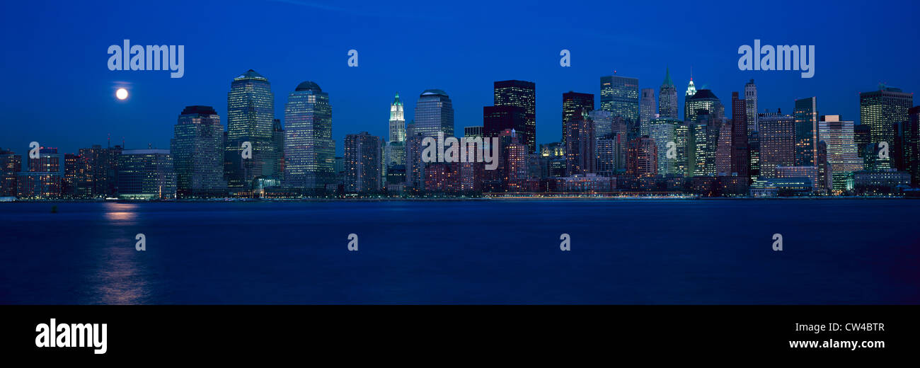 Panoramic view of full moon rising over lower Manhattan skyline, NY ...