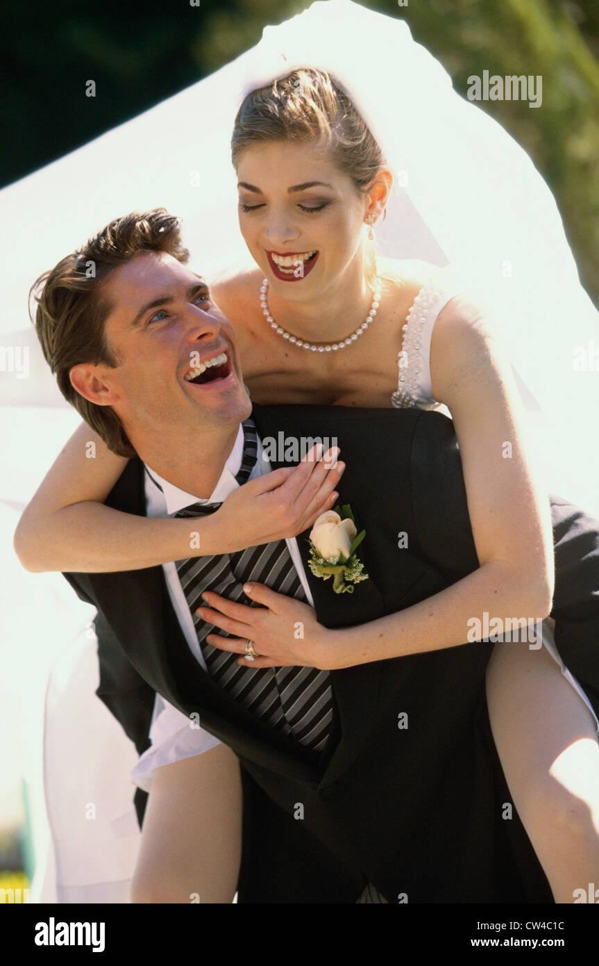 Piggyback bride hi-res stock photography and images - Alamy