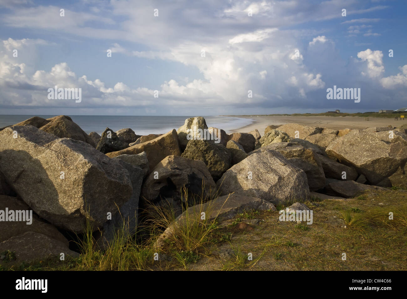 Large Rocks along a beach at Fort Fisher, North Carolina Stock Photo ...