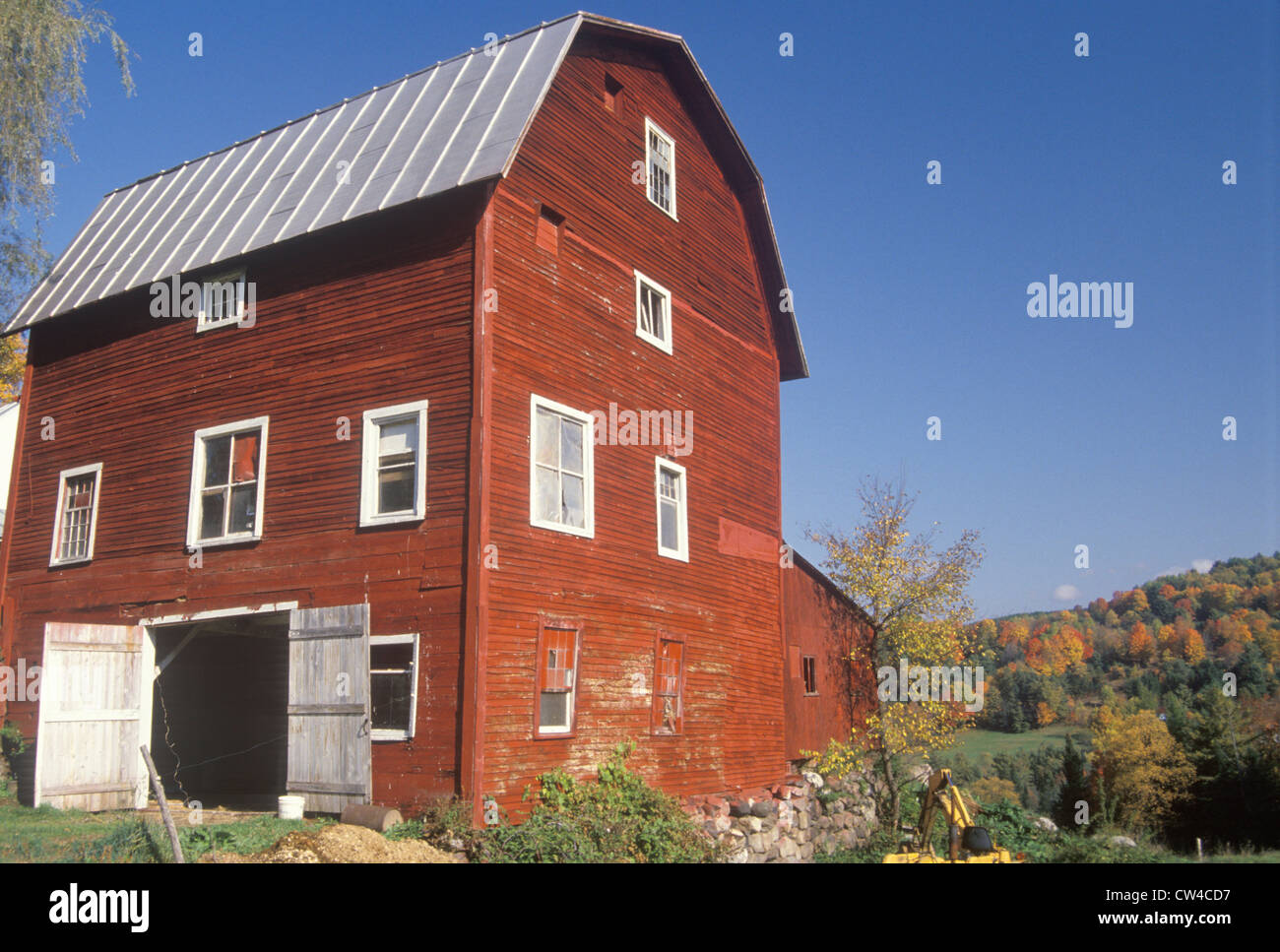 A three story red barn in autumn in VT Stock Photo - Alamy