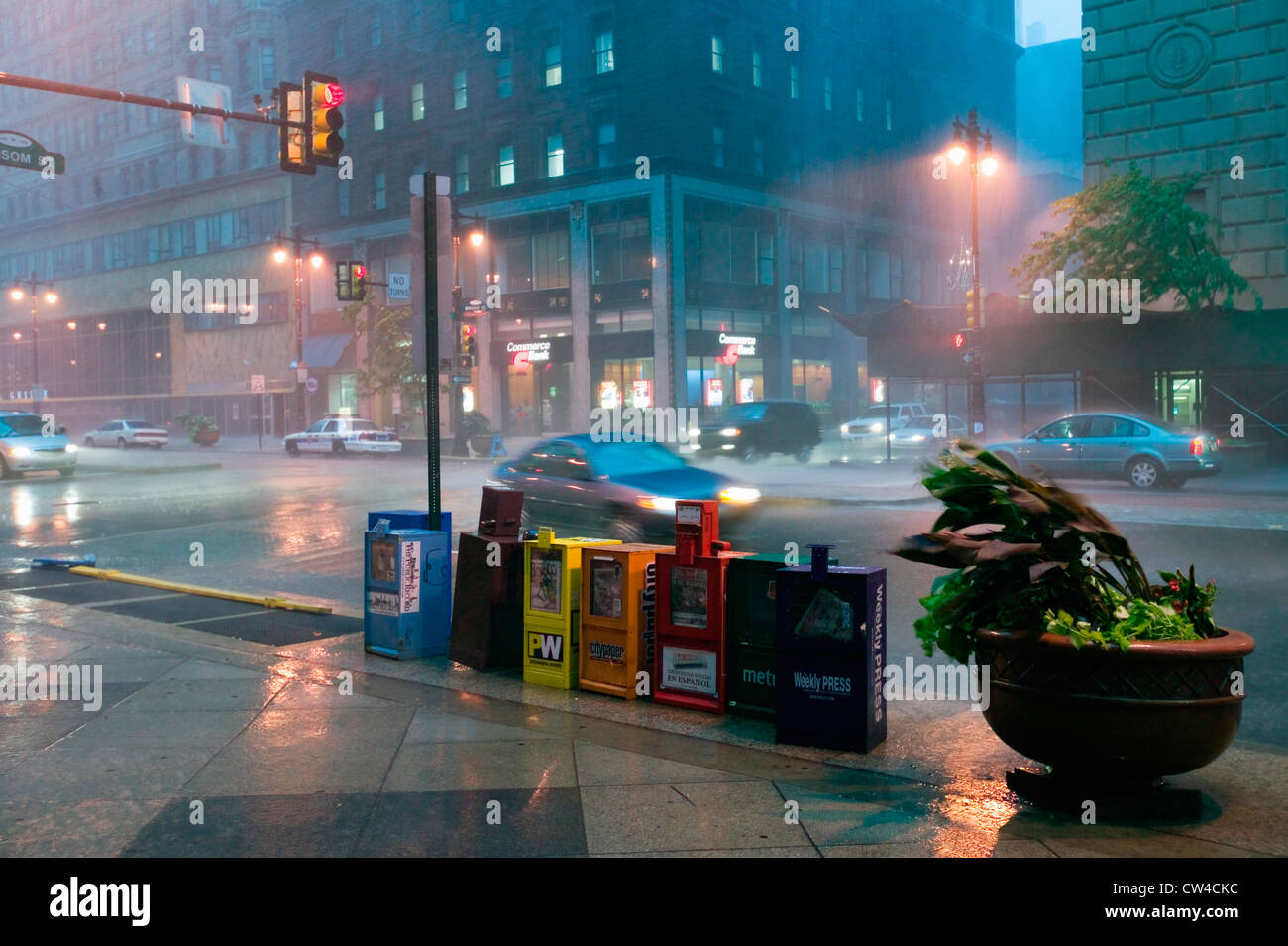Newspaper stands during rain storm in downtown Philadelphia ...