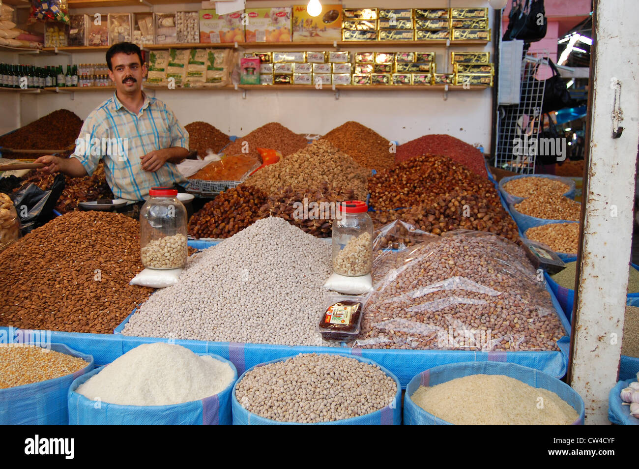A man selling spices in a market in Goa, India Stock Photo - Alamy