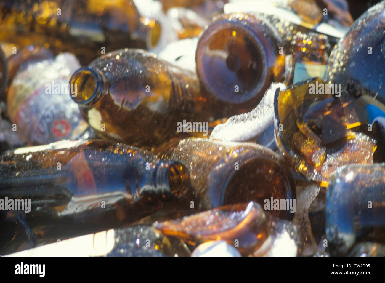 Empty bottles in a pile waiting for recycling Stock Photo - Alamy