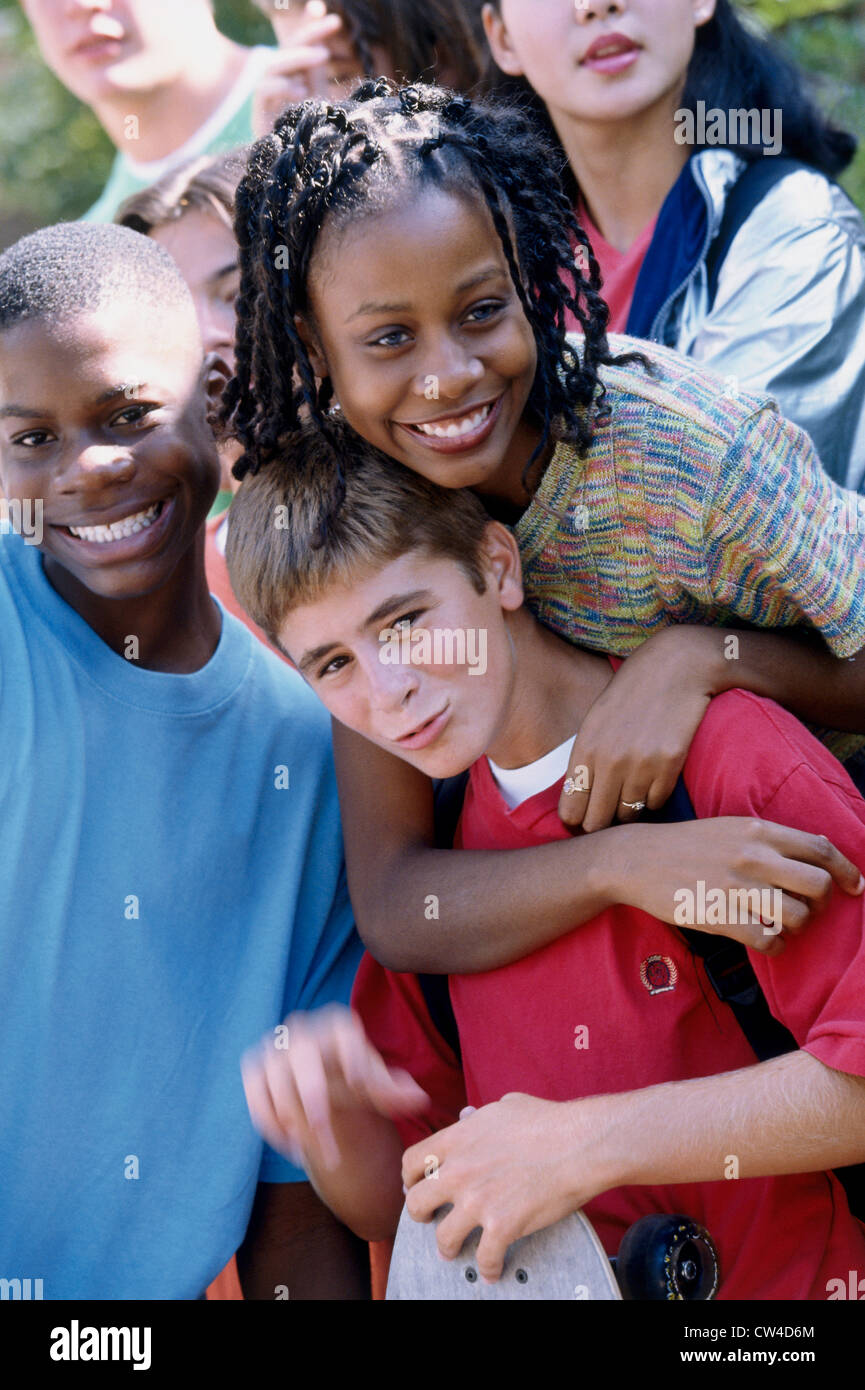 Portrait of a group of teenagers smiling Stock Photo - Alamy