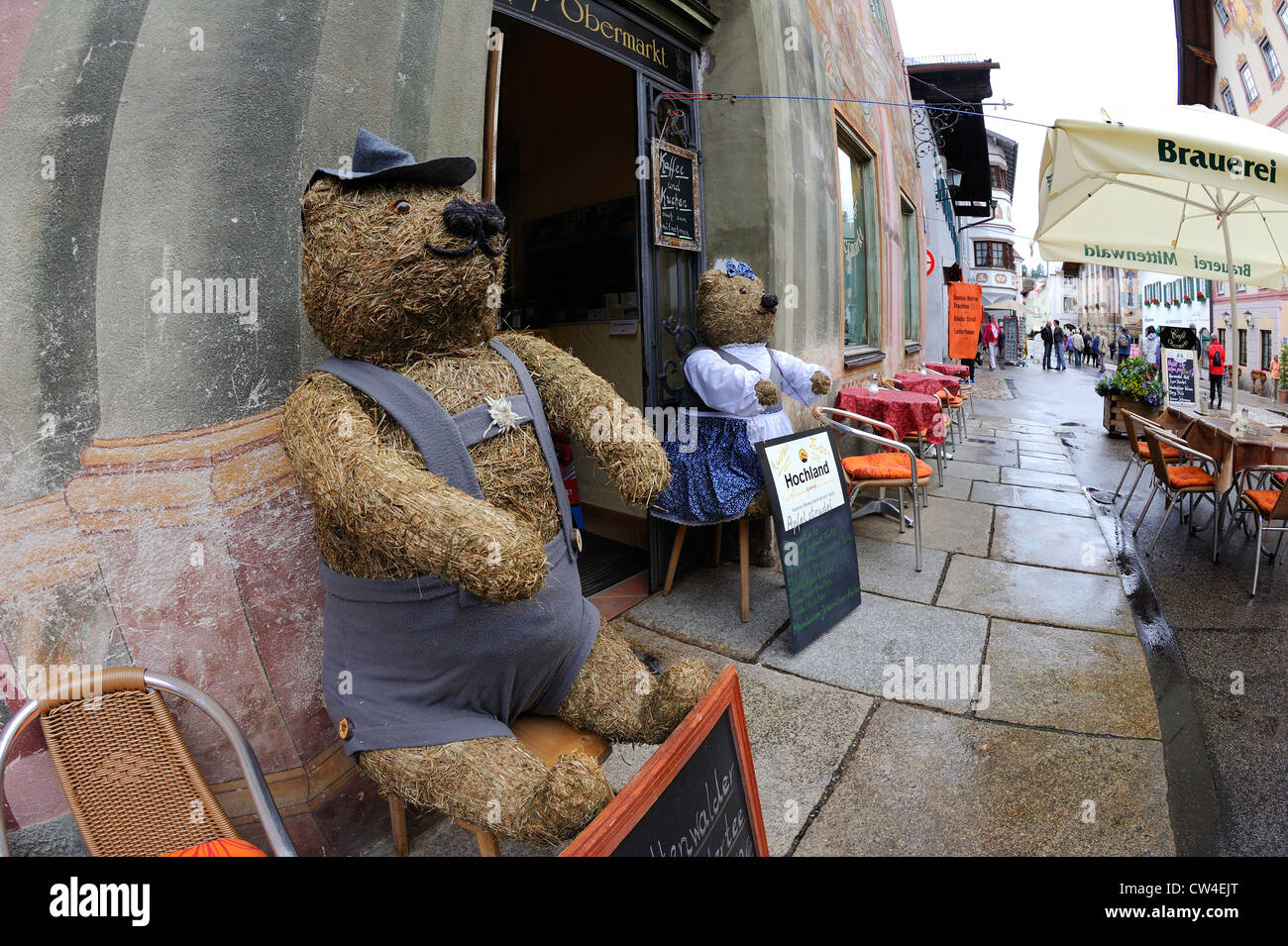 Male and female bears made from straw and dressed in traditional German ...