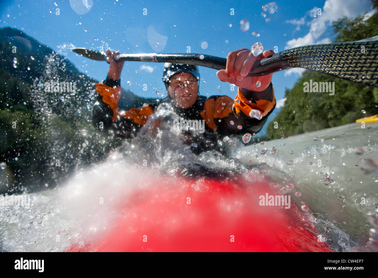 Whitewater kayaker riding rapid on Inn River near Pfunds, Austria Stock ...