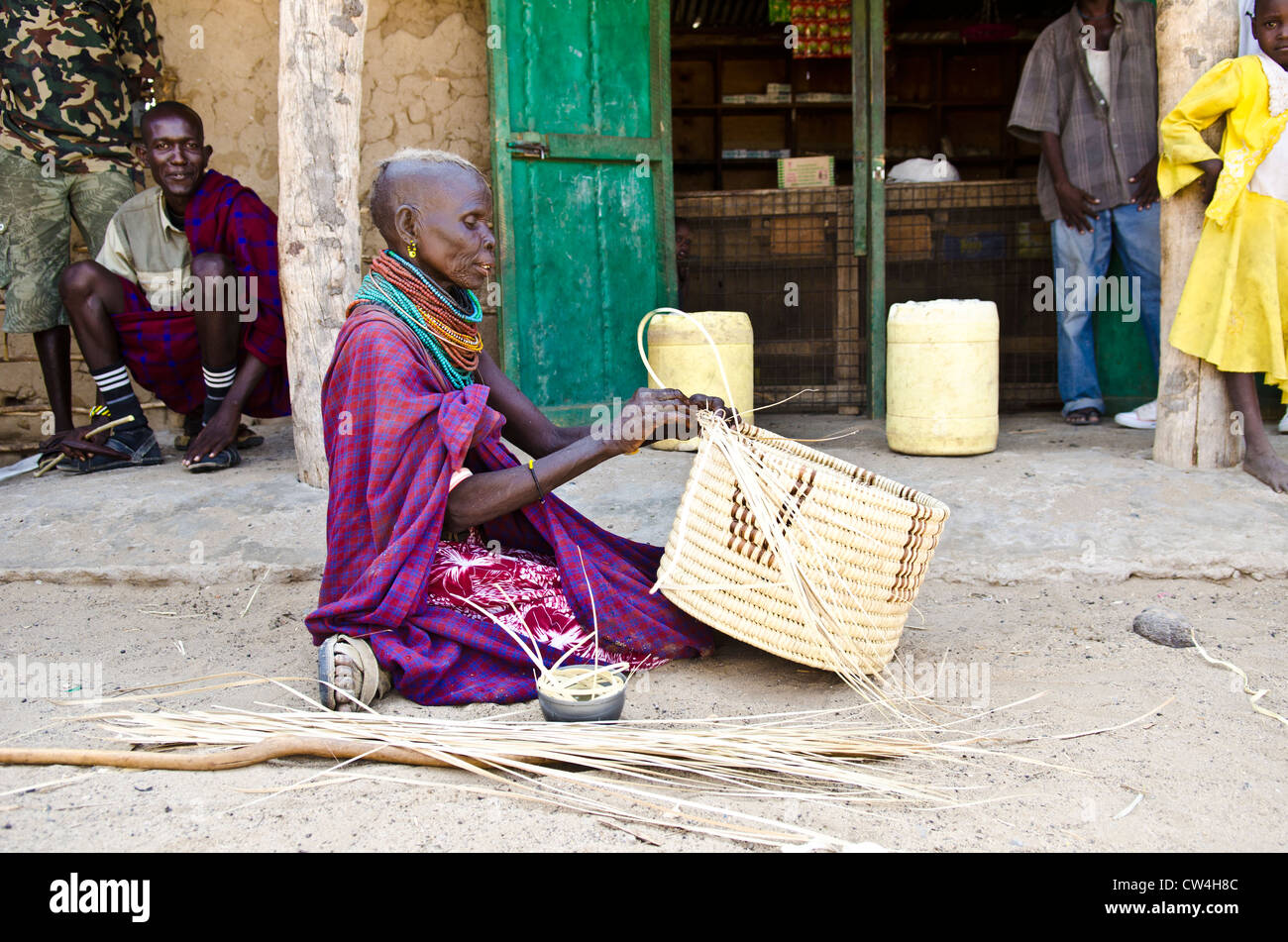 Turkana tribes woman weaving a basket, Northern Kenya Stock Photo - Alamy