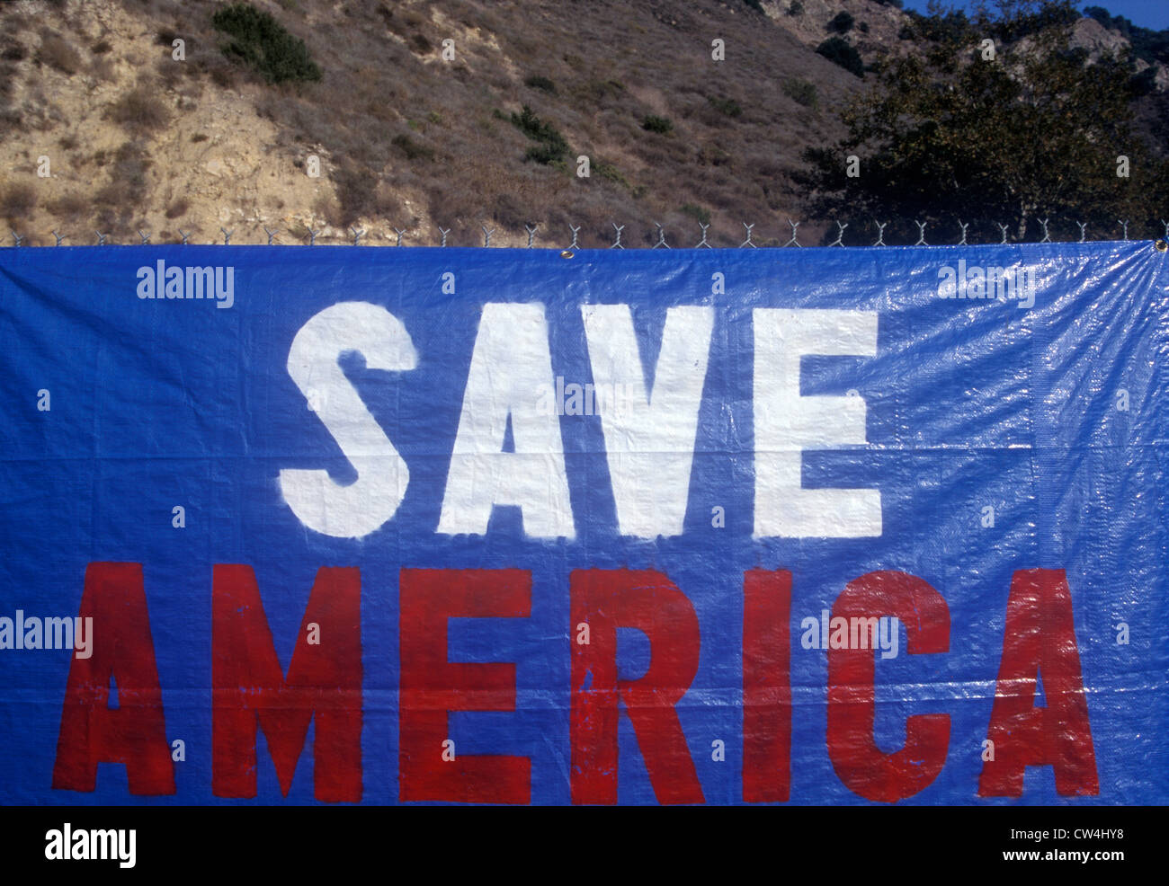 Sign on fence reads Save America Stock Photo - Alamy