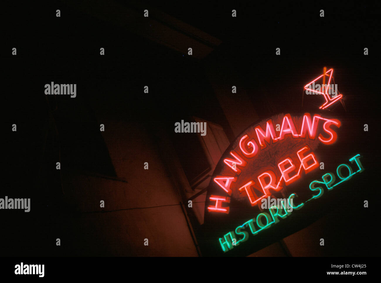 A neon sign that reads ?Hangman's Tree, historic spot Stock Photo - Alamy