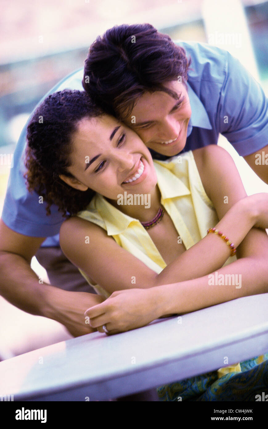 Young man bending over table hi-res stock photography and images - Alamy