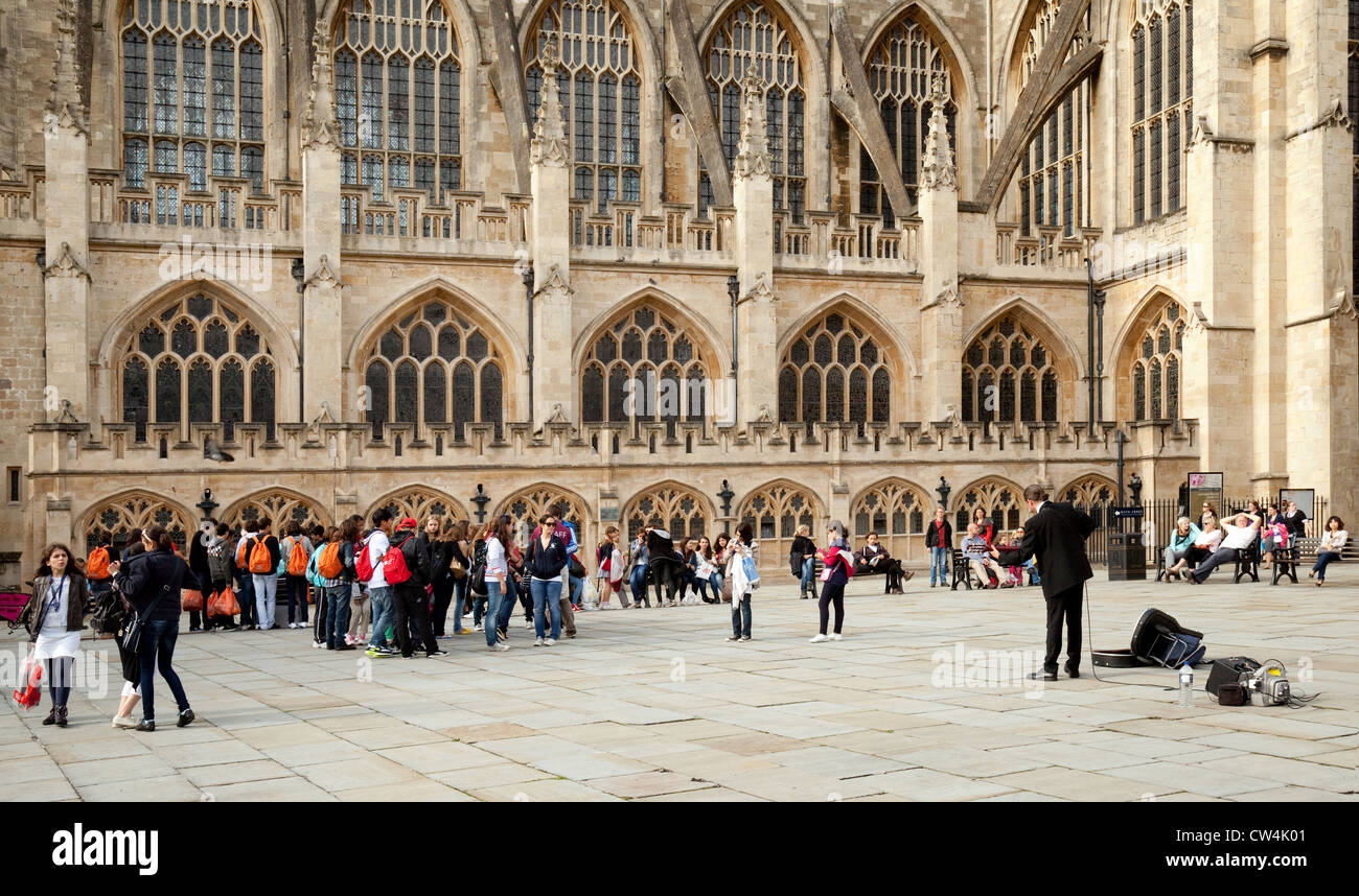 A busker playing in the Abbey Churchyard, Bath Somerset UK Stock Photo ...