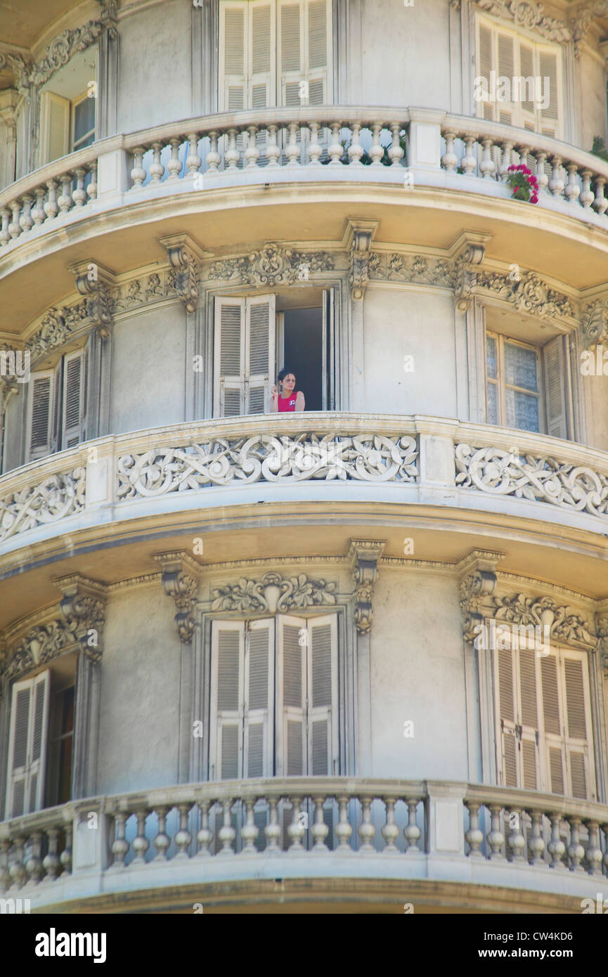 Girl smoking cigarette on balcony of apartment, Nice, France Stock ...