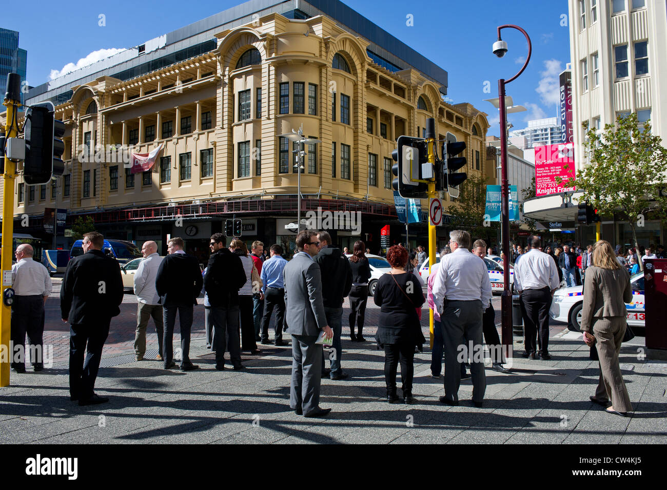 Pedestrians waiting cross intersection in hi-res stock photography and ...