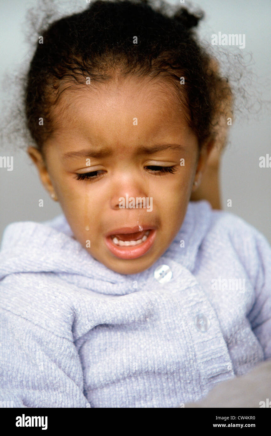 Close-up of a girl crying Stock Photo - Alamy