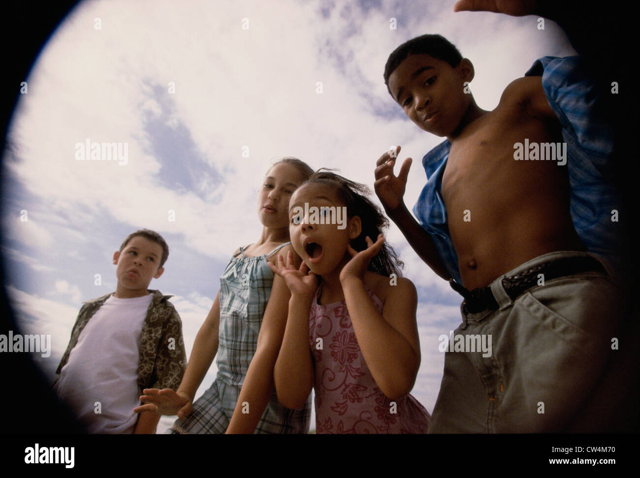 Portrait group children making faces hi-res stock photography and ...