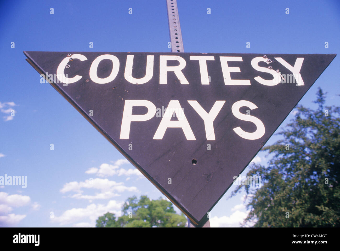 A sign that reads ?Courtesy pays Stock Photo - Alamy