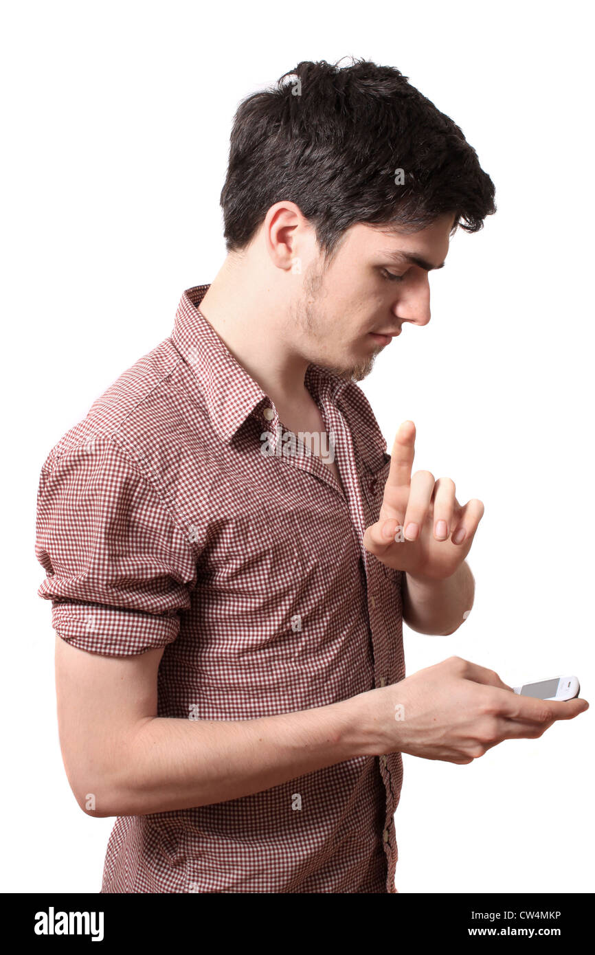 Eighteen year old young man holding his cellphone and one finger up ...