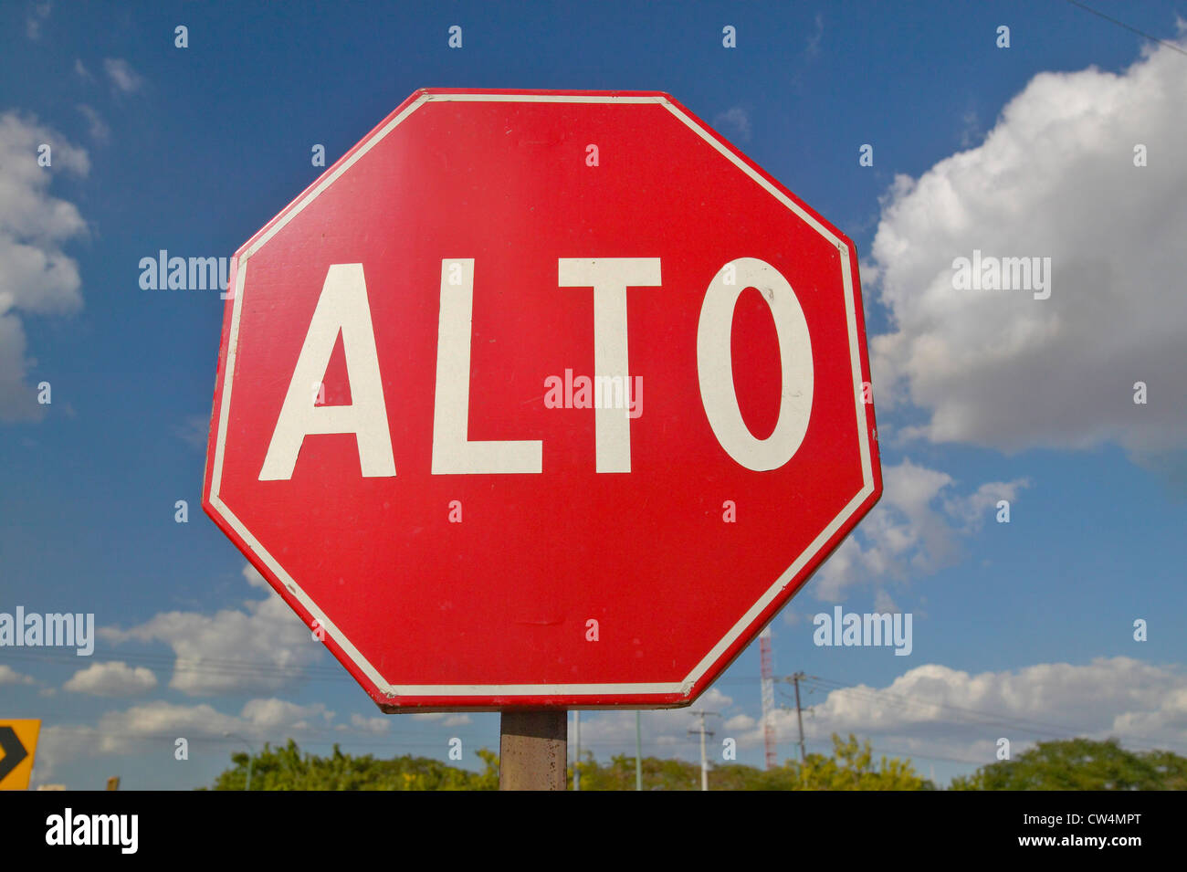 A stop sign reads Alto in the Yucatan Peninsula, Mexico Stock Photo - Alamy
