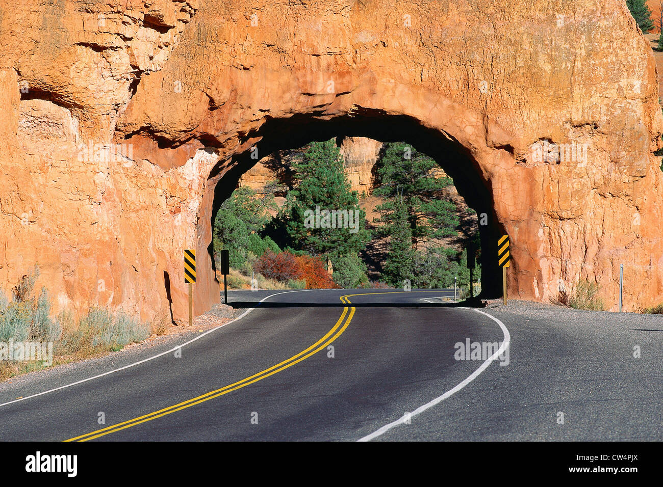 Red rock tunnel on highway Stock Photo - Alamy