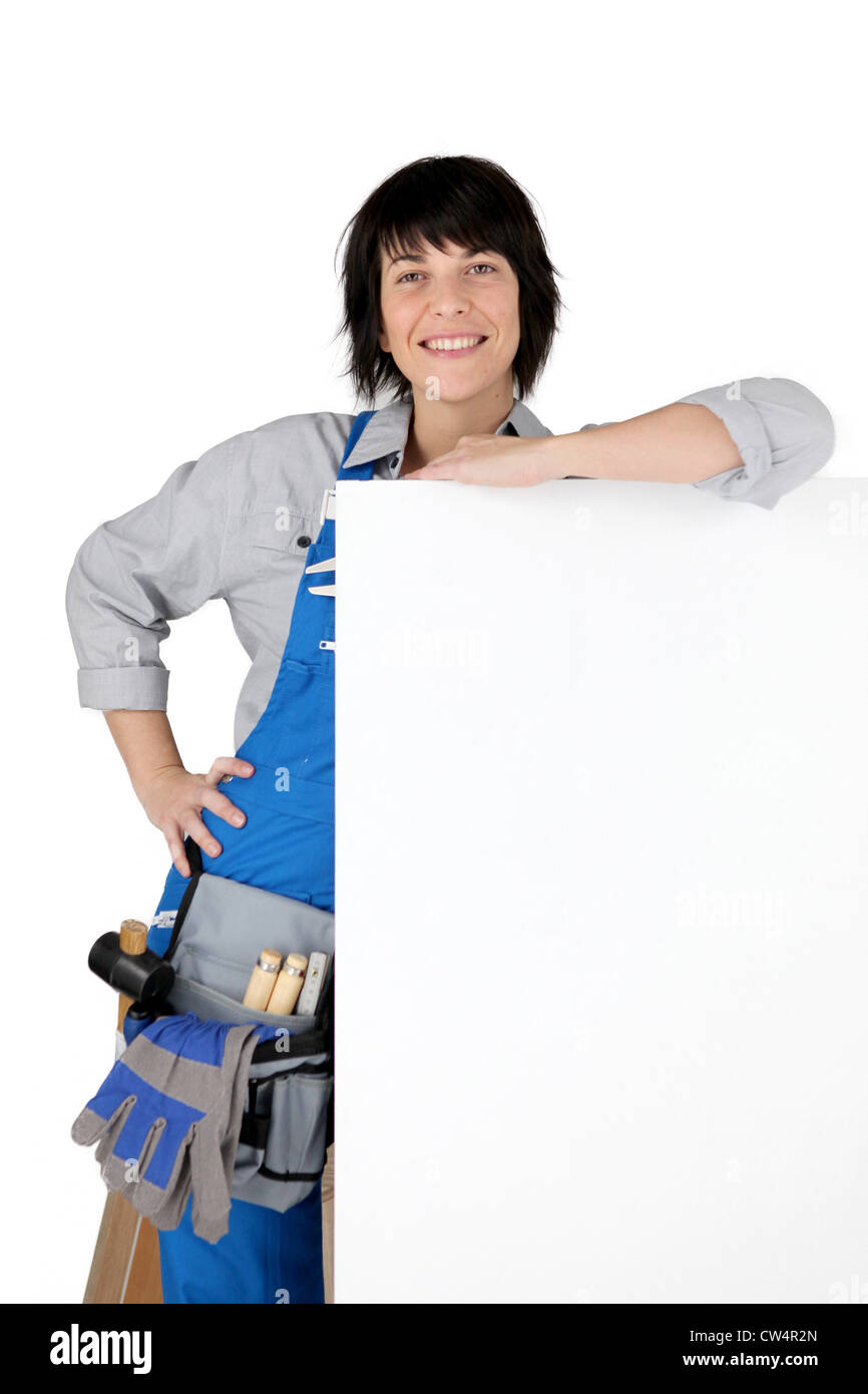 Female DIY person stood with blank poster Stock Photo - Alamy