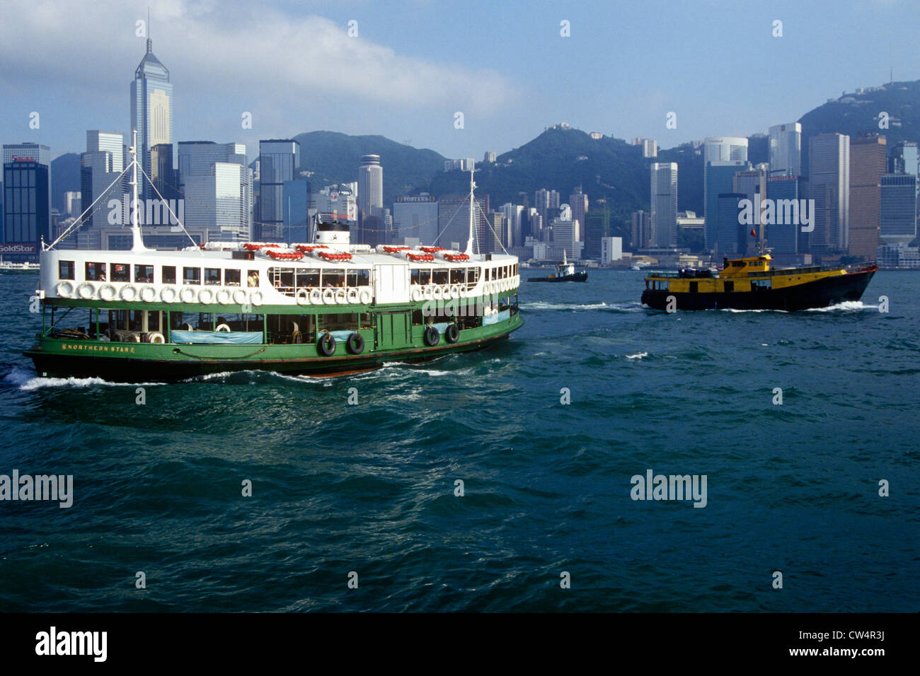 Star Ferry in Hong Kong Harbor with skyline in background Stock Photo ...