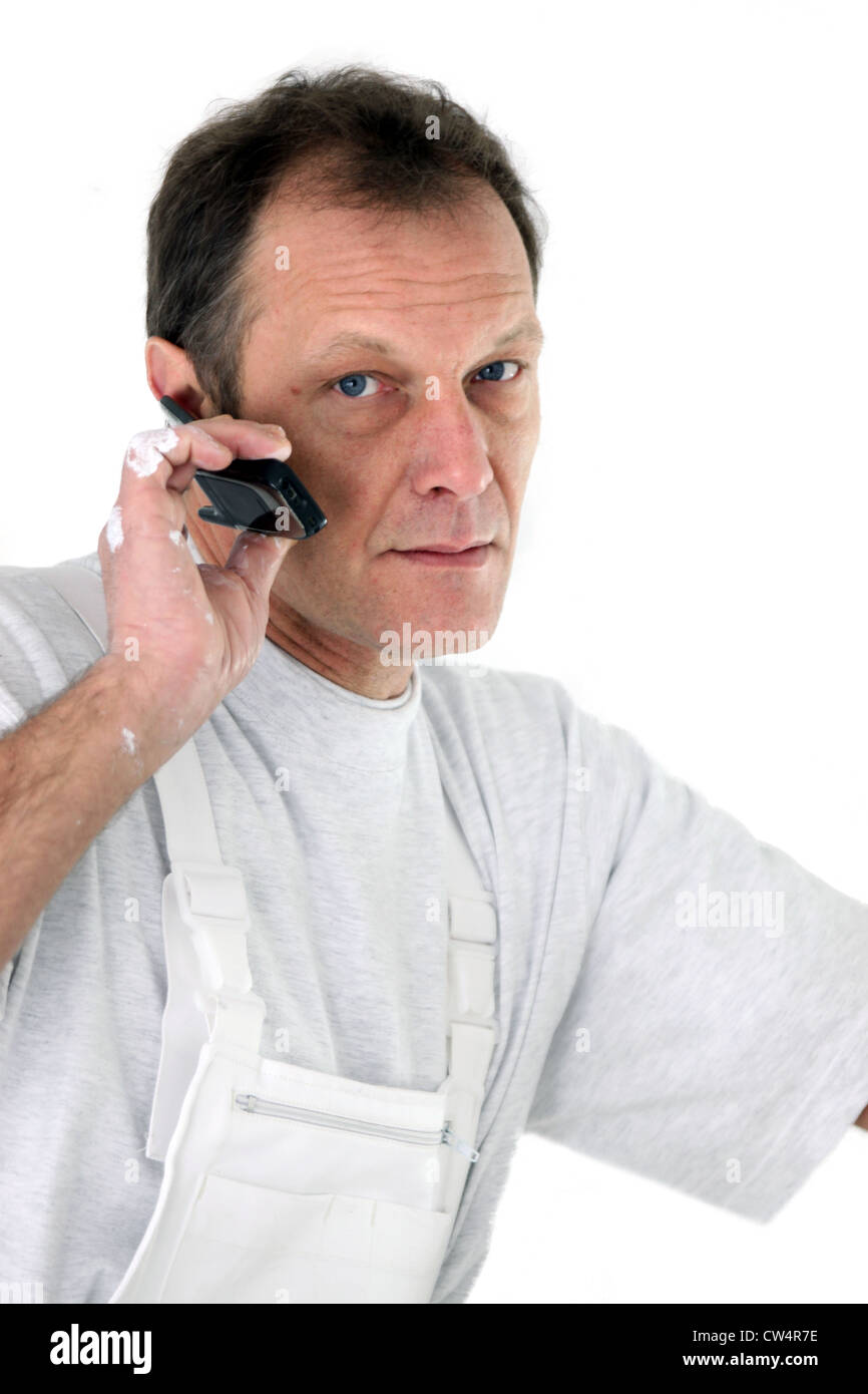 Decorator on the phone Stock Photo - Alamy